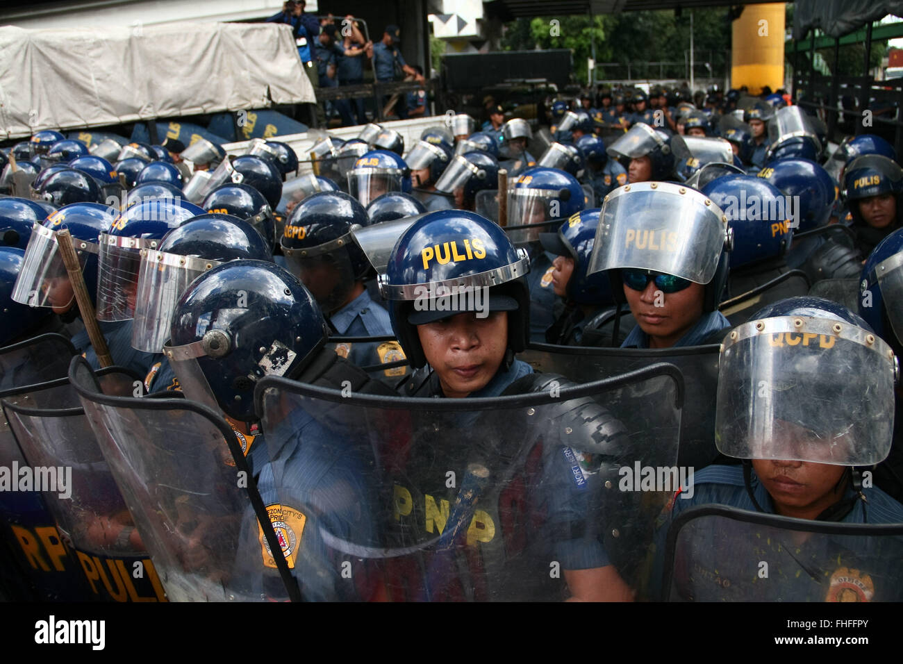 Philippines. 25th Feb, 2016. Crowd control police officers block ...
