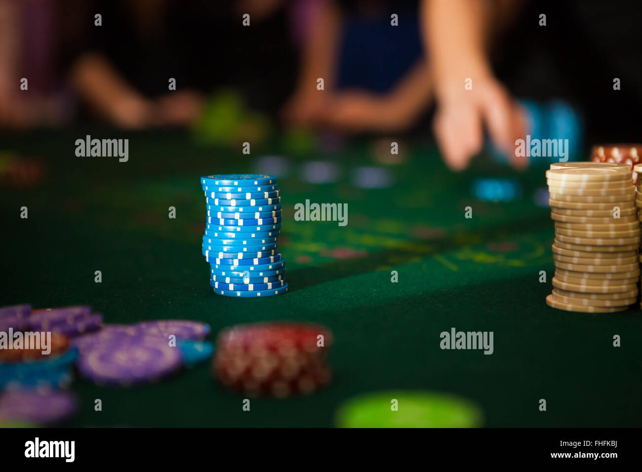 green roulette table with collored chips ready to play Stock Photo - Alamy