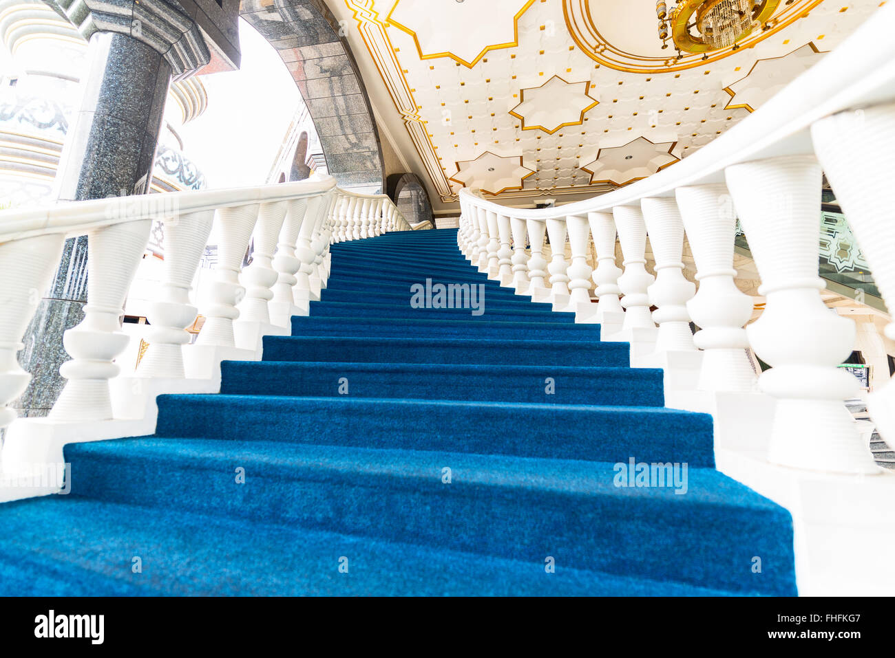 Blue stairs up to modern mosque Stock Photo - Alamy