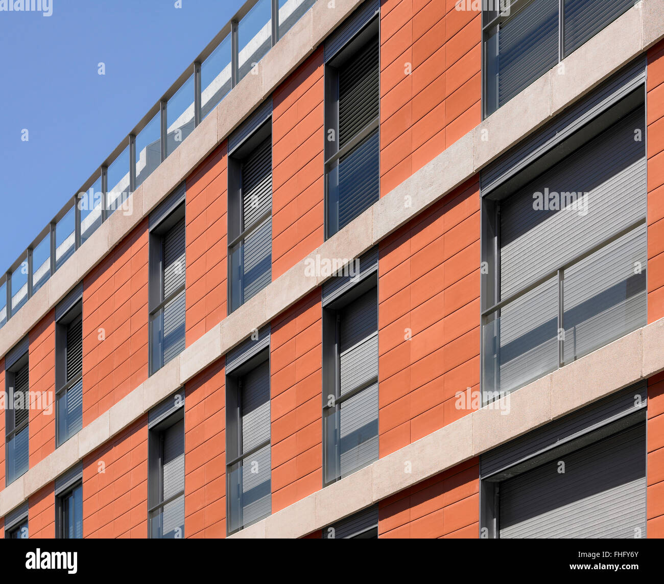 Modern building ceramic material facade with orange tone Stock Photo ...