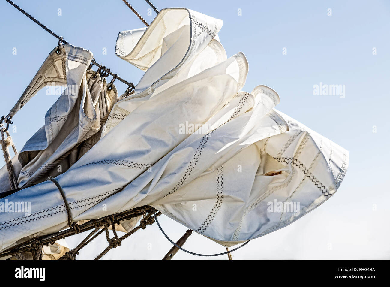 closeup of a reefed sails and blue sky Stock Photo - Alamy