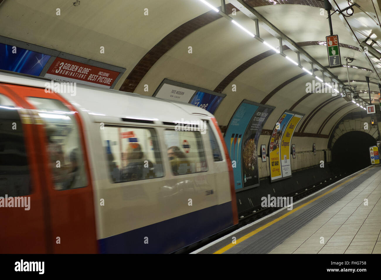 train arriving at a London Underground station England Stock Photo - Alamy