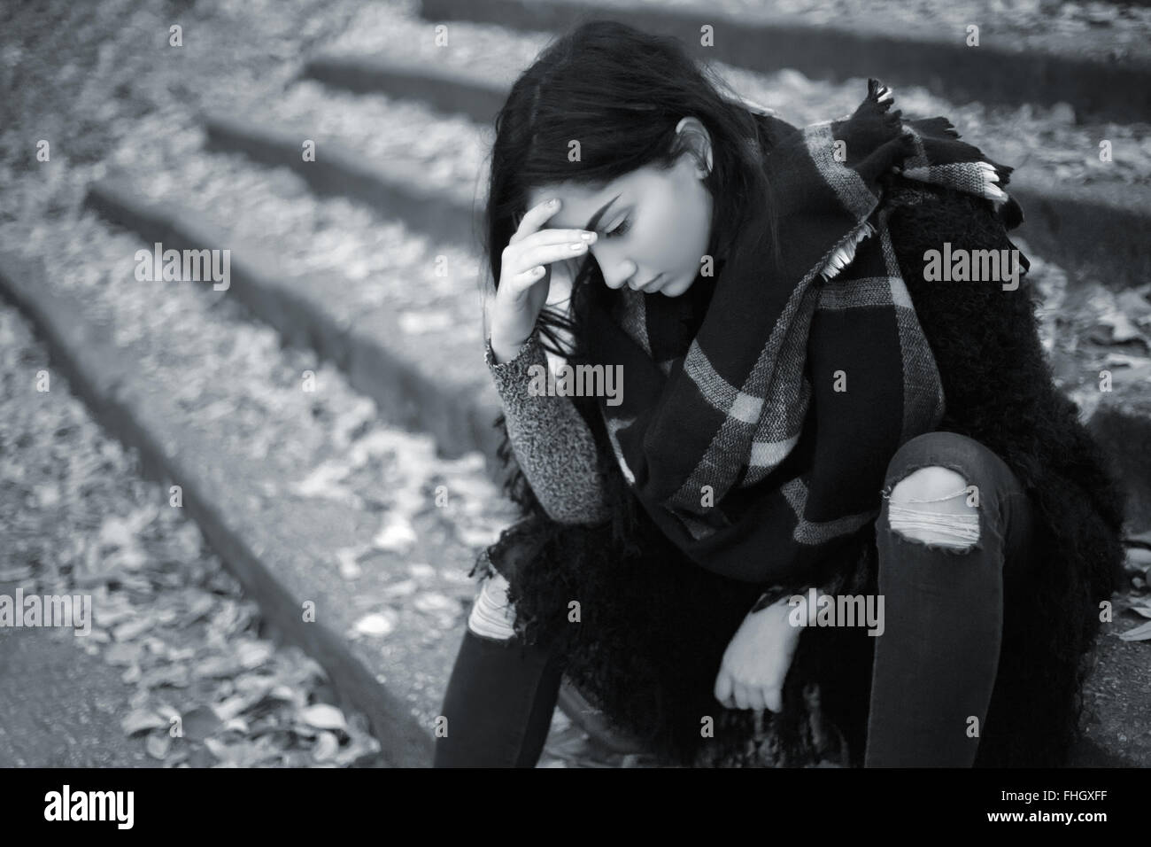 Sad teen girl outdoor feeling depressed Stock Photo - Alamy