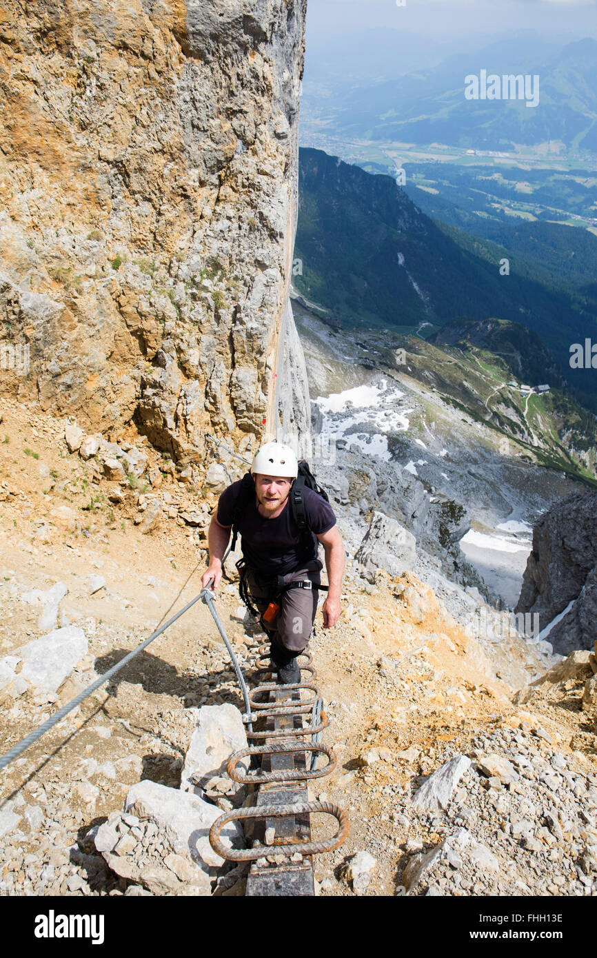 Austria, Tyrol, Wilder Kaiser, man on via ferrata towards Ellmauer Halt ...