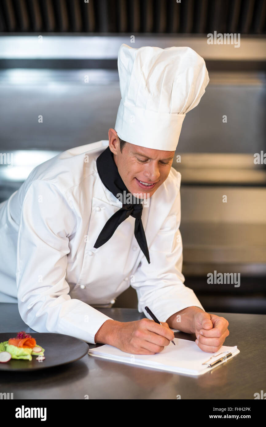 Chef planning his menu Stock Photo - Alamy