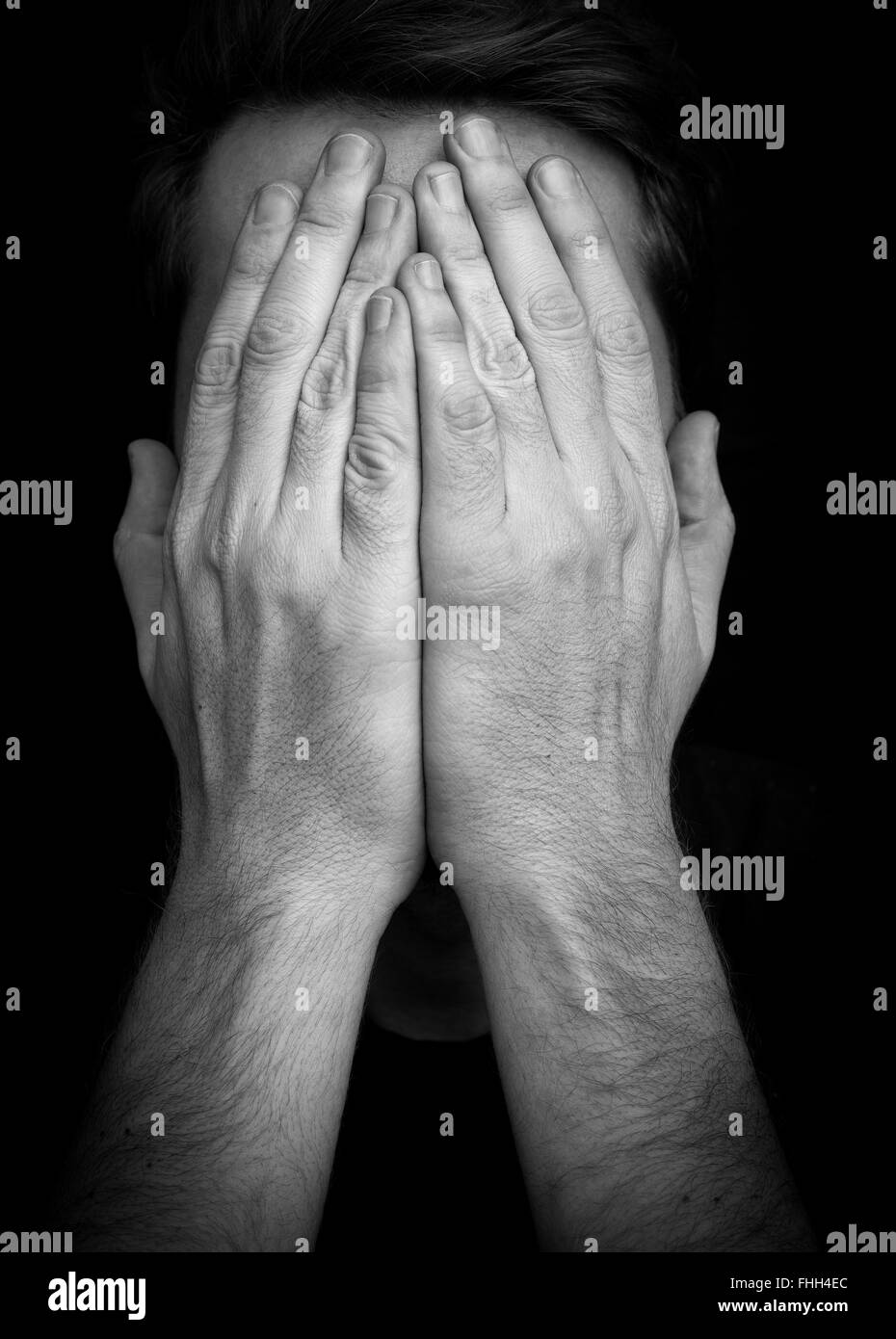 Man Covering Face Dark Stock Photos & Man Covering Face Dark Stock ...