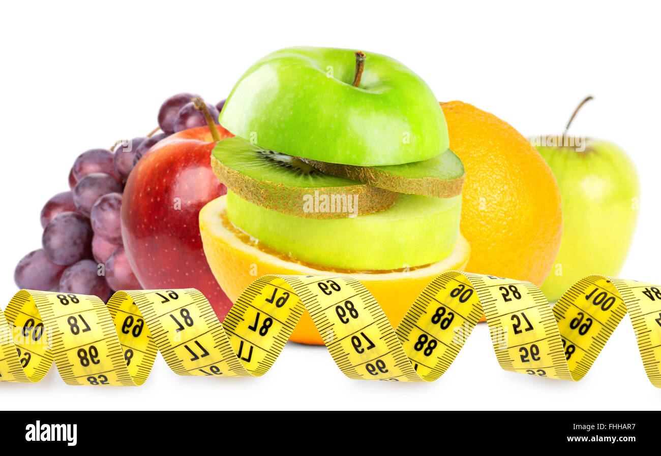 Fresh fruits with measuring tape Stock Photo - Alamy