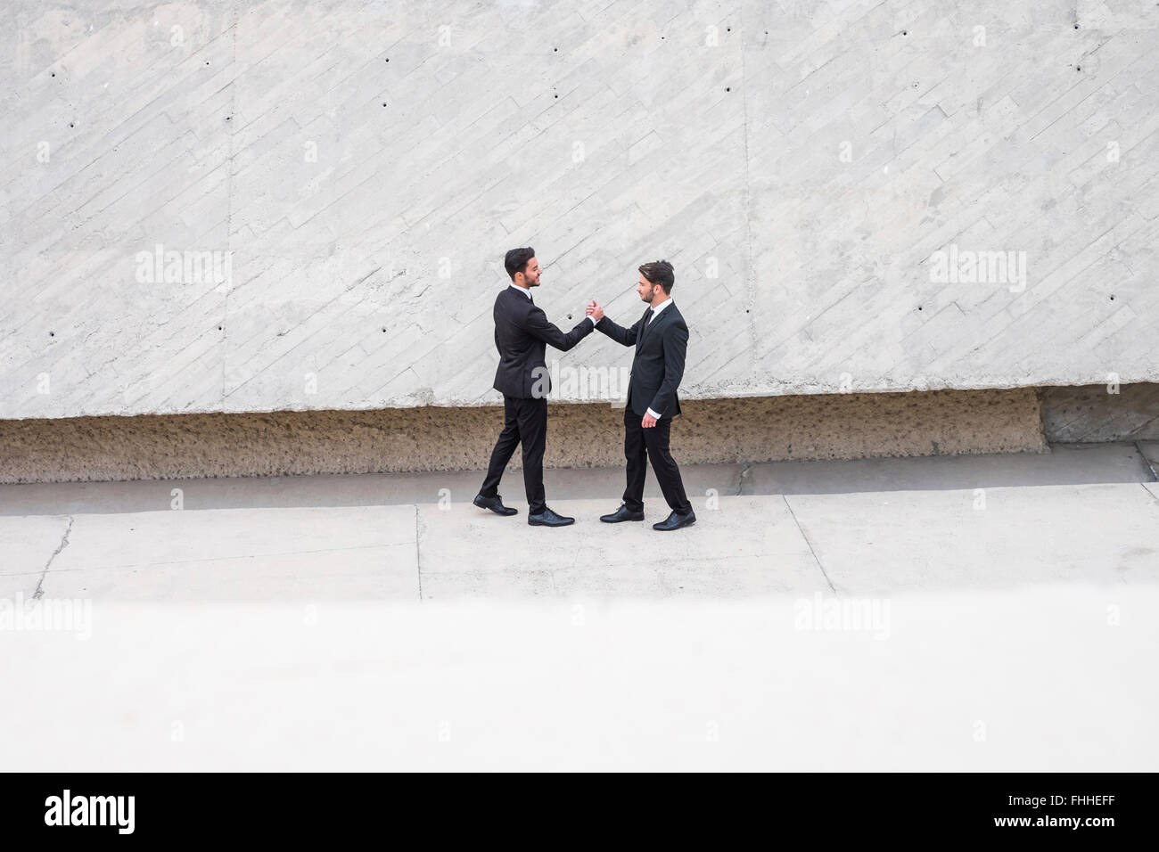 Two People Standing Opposite Each Other High Resolution Stock ...