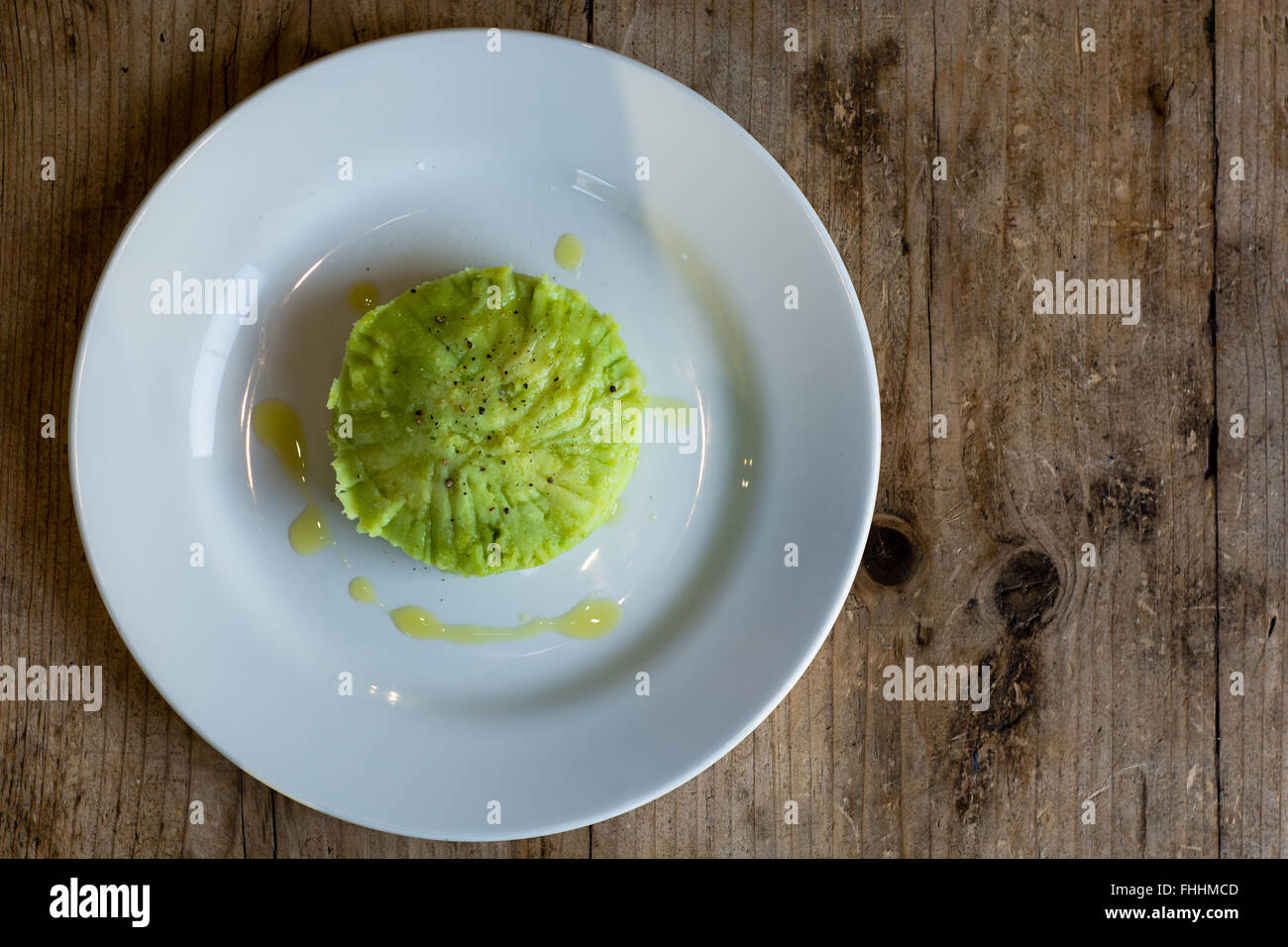 Green mashed potato. French restaurant prepared mash, green by ...