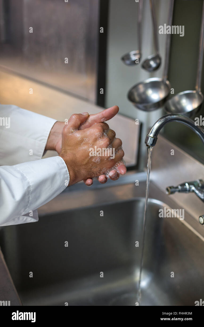 Chef washing his hands Stock Photo - Alamy