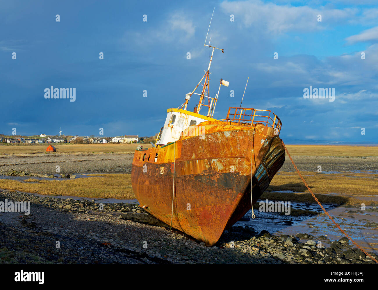 Rusty boat stranded on beach, Roa Island, Cumbria, England UK Stock ...