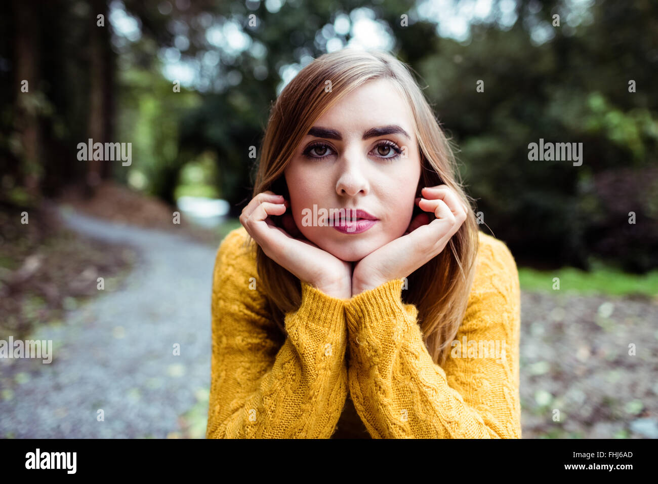 Chin resting hands hi-res stock photography and images - Alamy