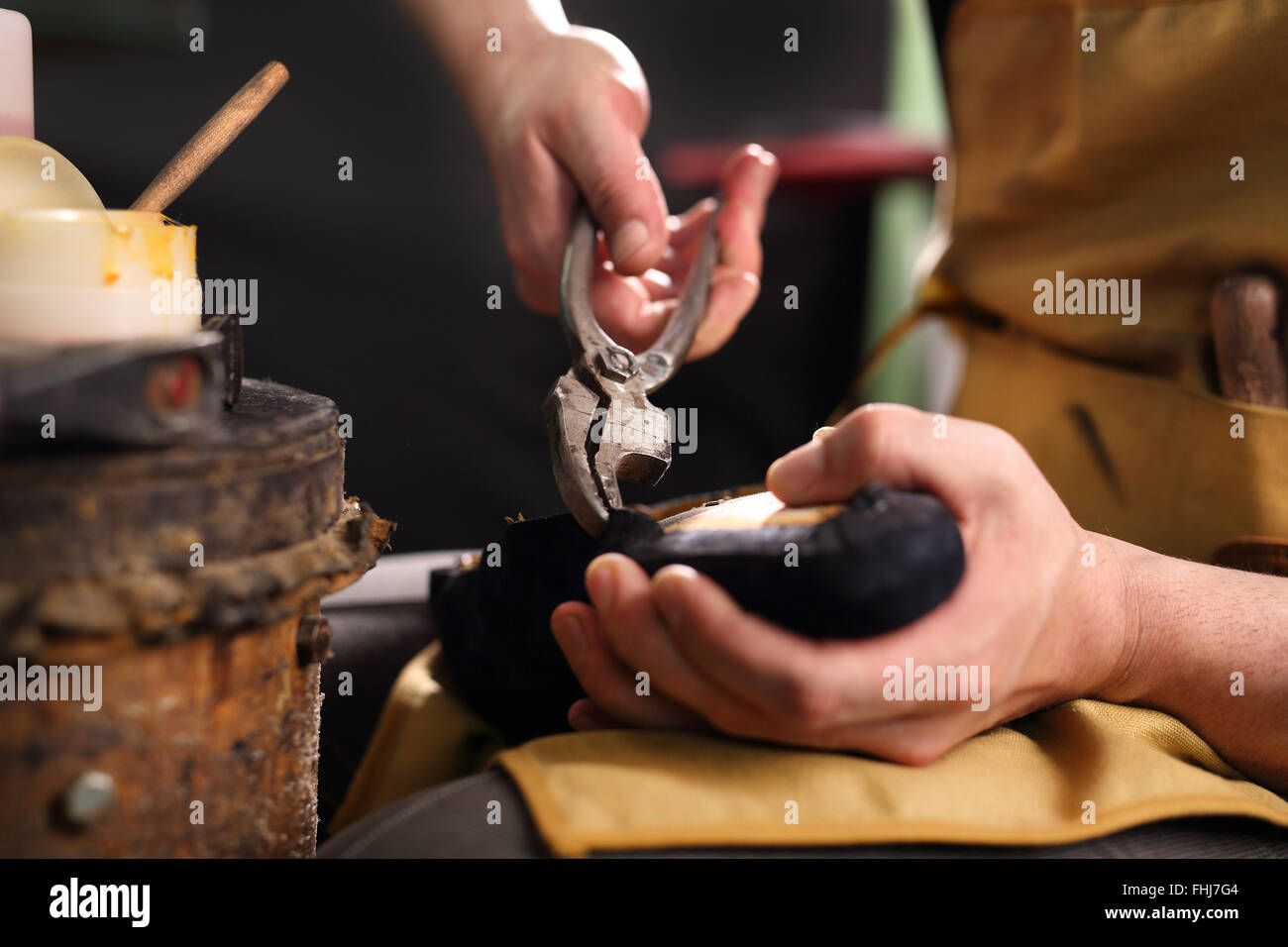 Classic men's elegance, stitched shoes at the cobbler. Men's shoes made ...