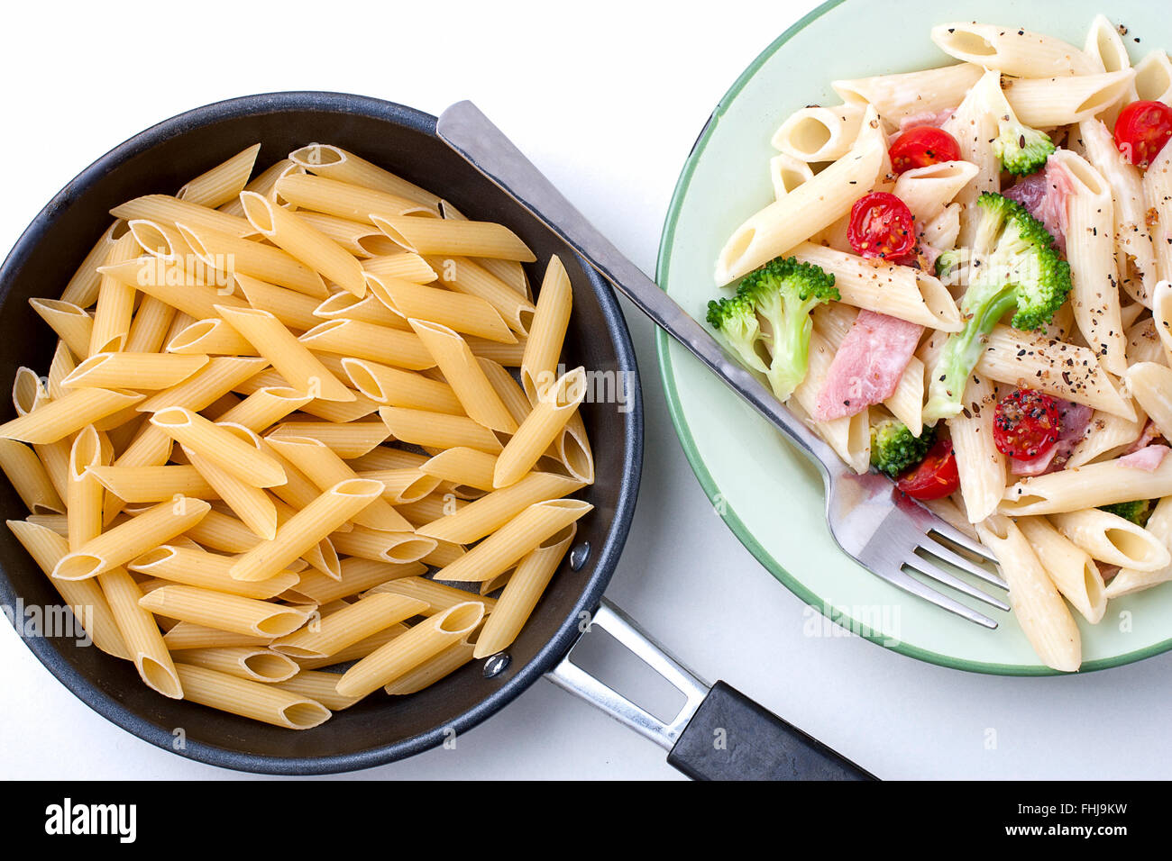 Raw pasta in small blue hi-res stock photography and images - Alamy