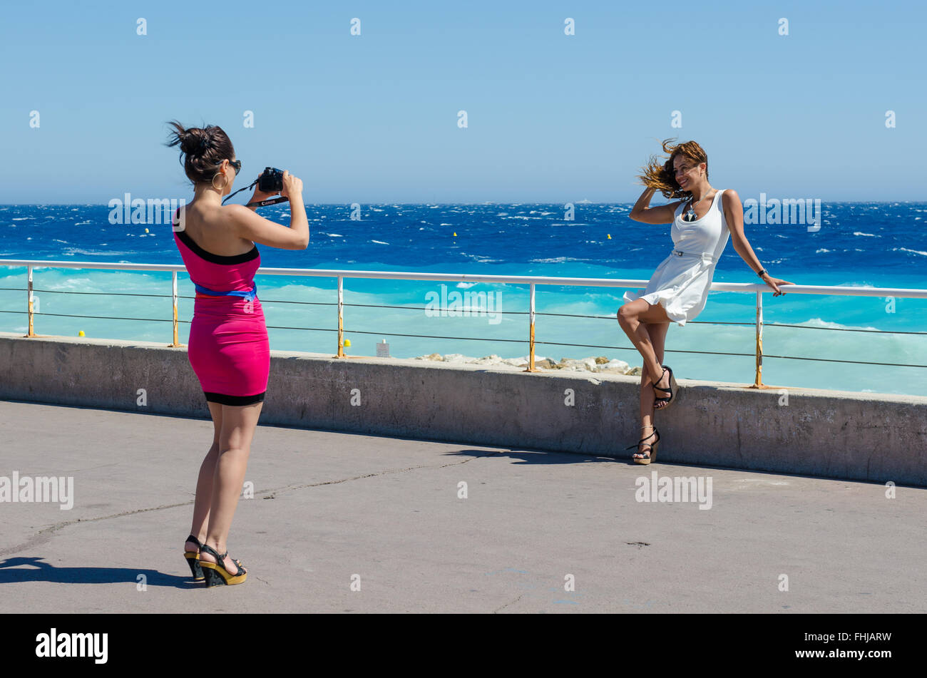 Two Girls Beside The Sea High Resolution Stock Photography and Images ...