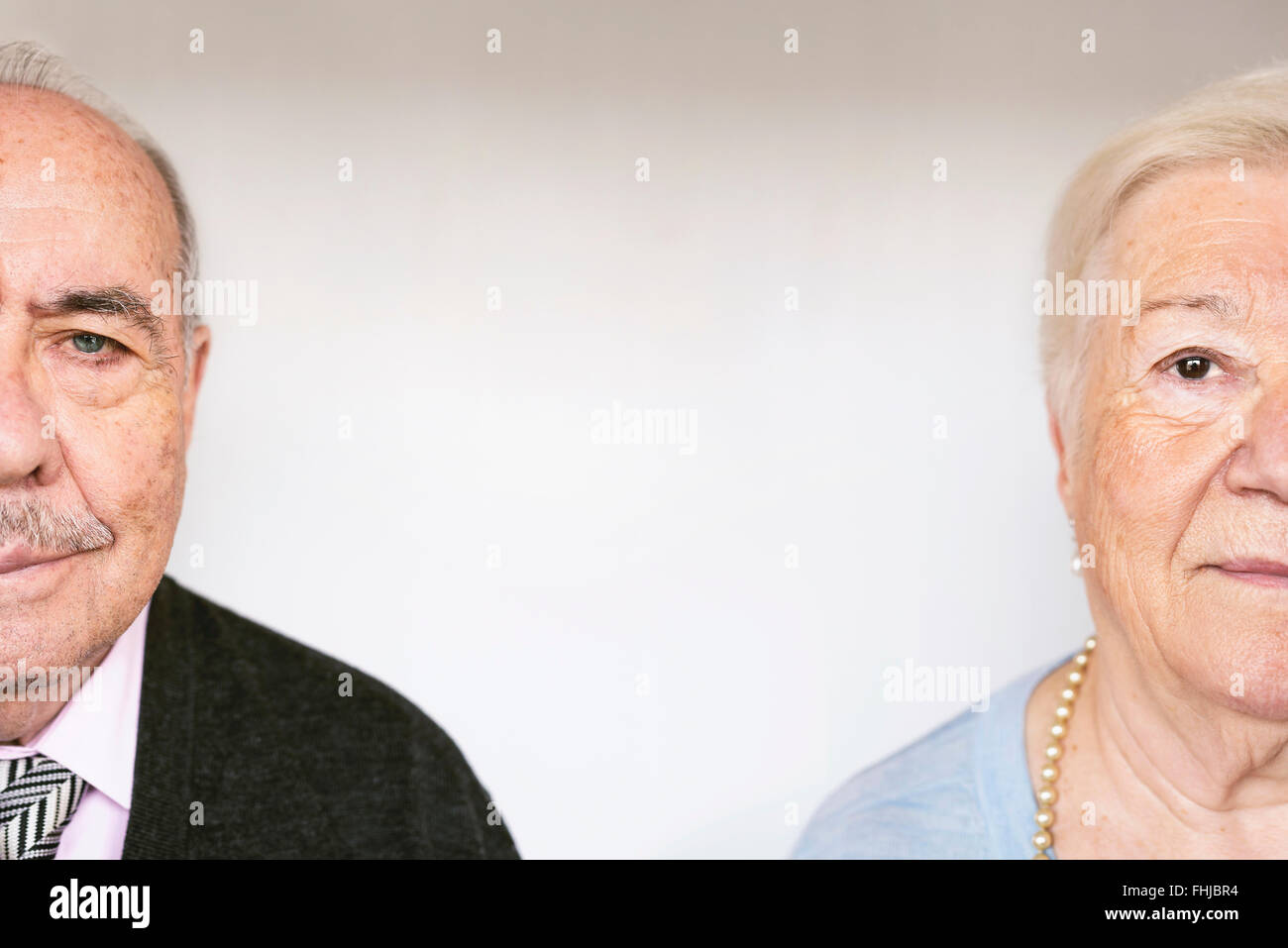 Senior couple side by side, partial view Stock Photo - Alamy