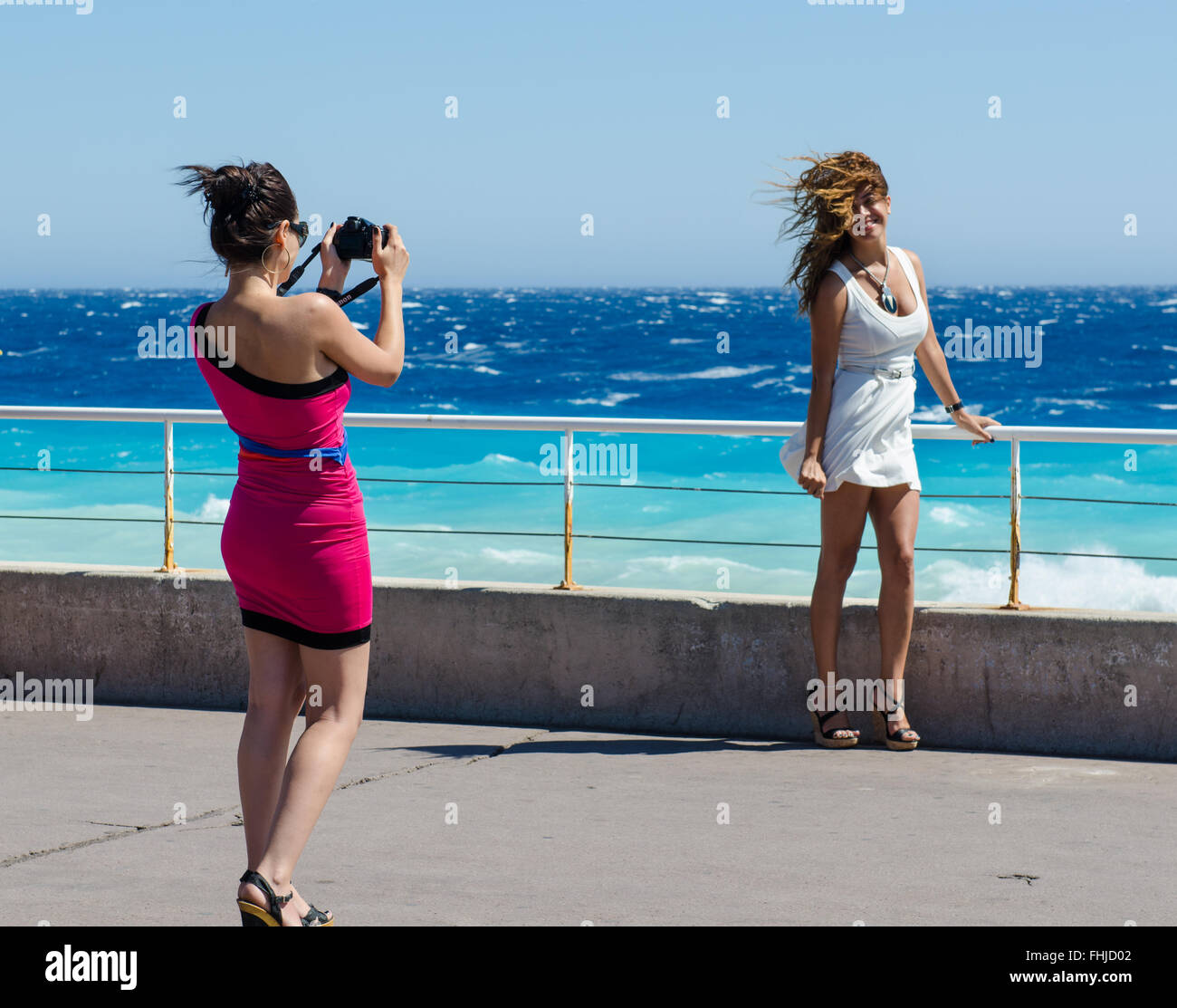 Two Girls Beside The Sea High Resolution Stock Photography and Images ...