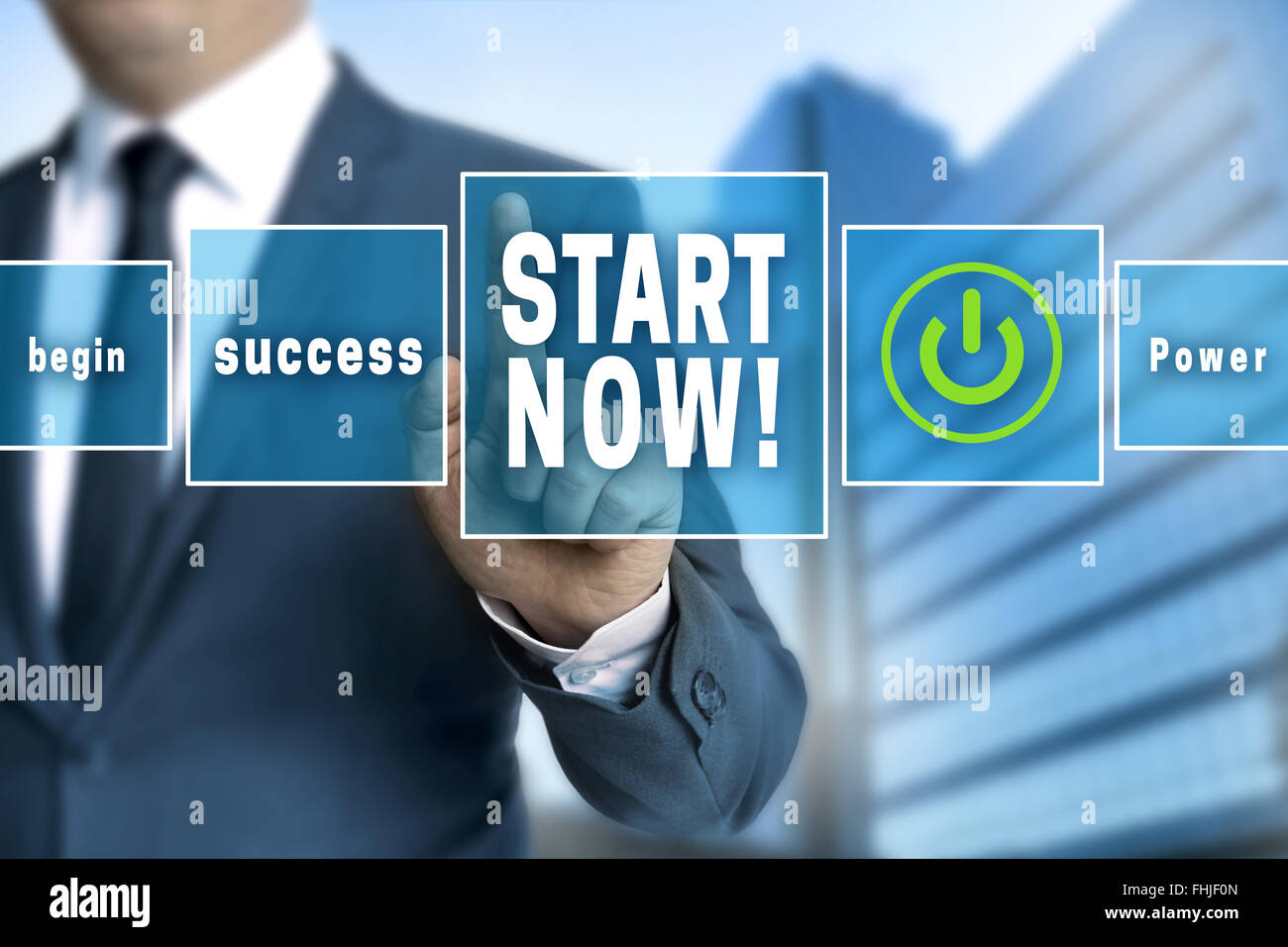 Start now touchscreen is operated by businessman Stock Photo - Alamy
