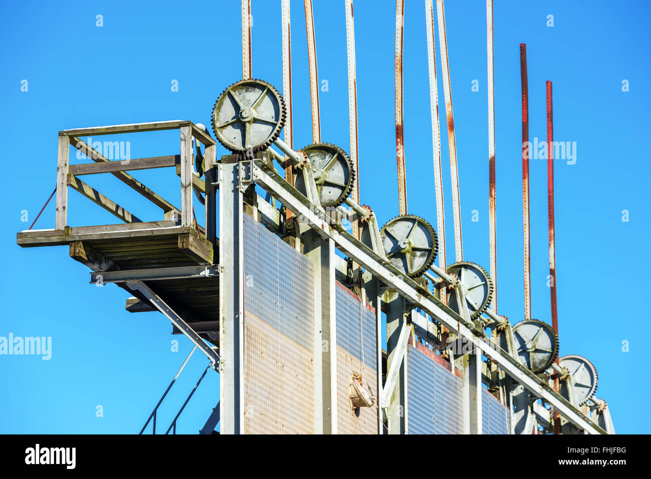 Detail of raised metal water gates at an abandoned paper mill Stock ...