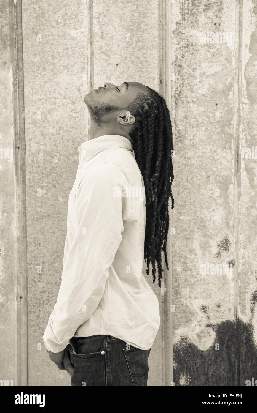 Dreadlocks covering face hi-res stock photography and images - Alamy