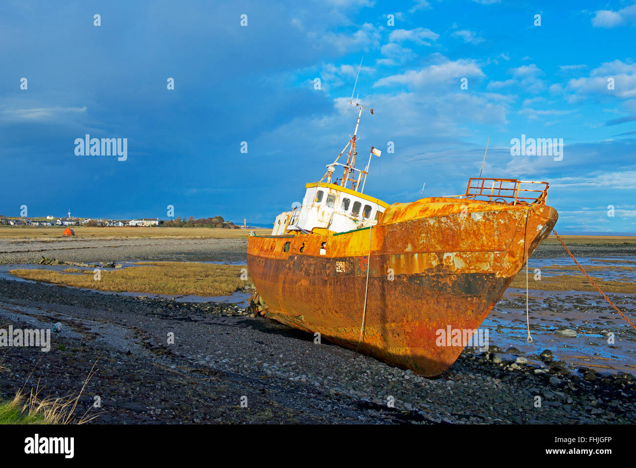 Rusty boat stranded on beach, Roa Island, Cumbria, England UK Stock ...