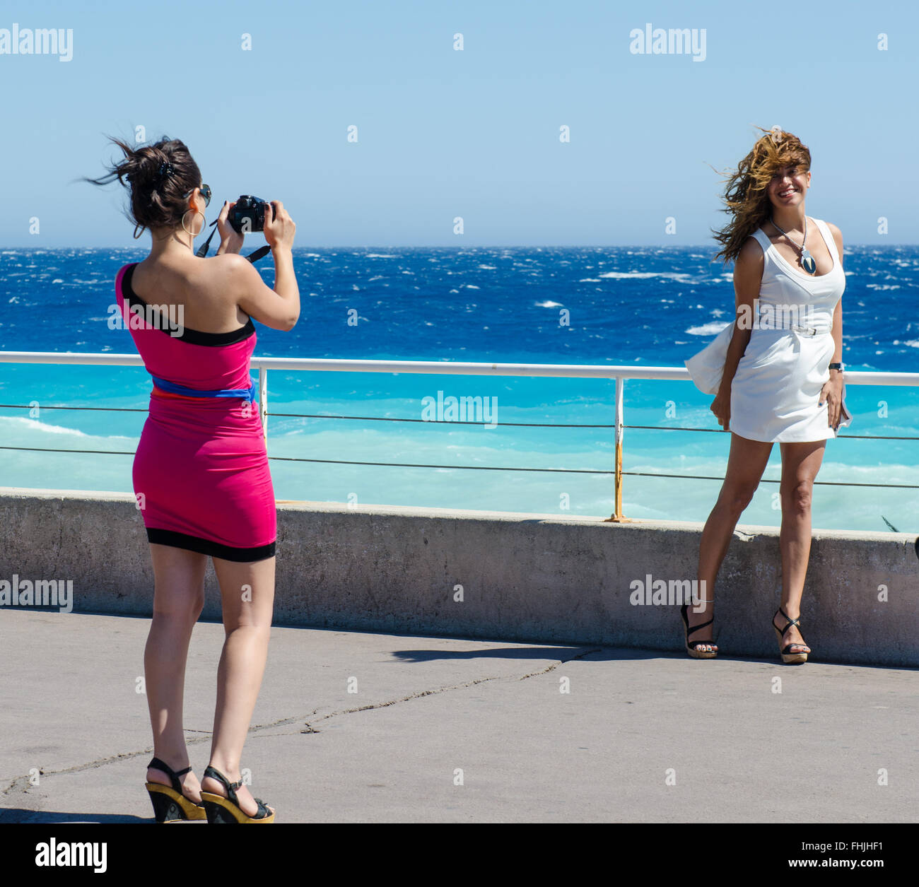 Two Girls Beside The Sea High Resolution Stock Photography and Images ...