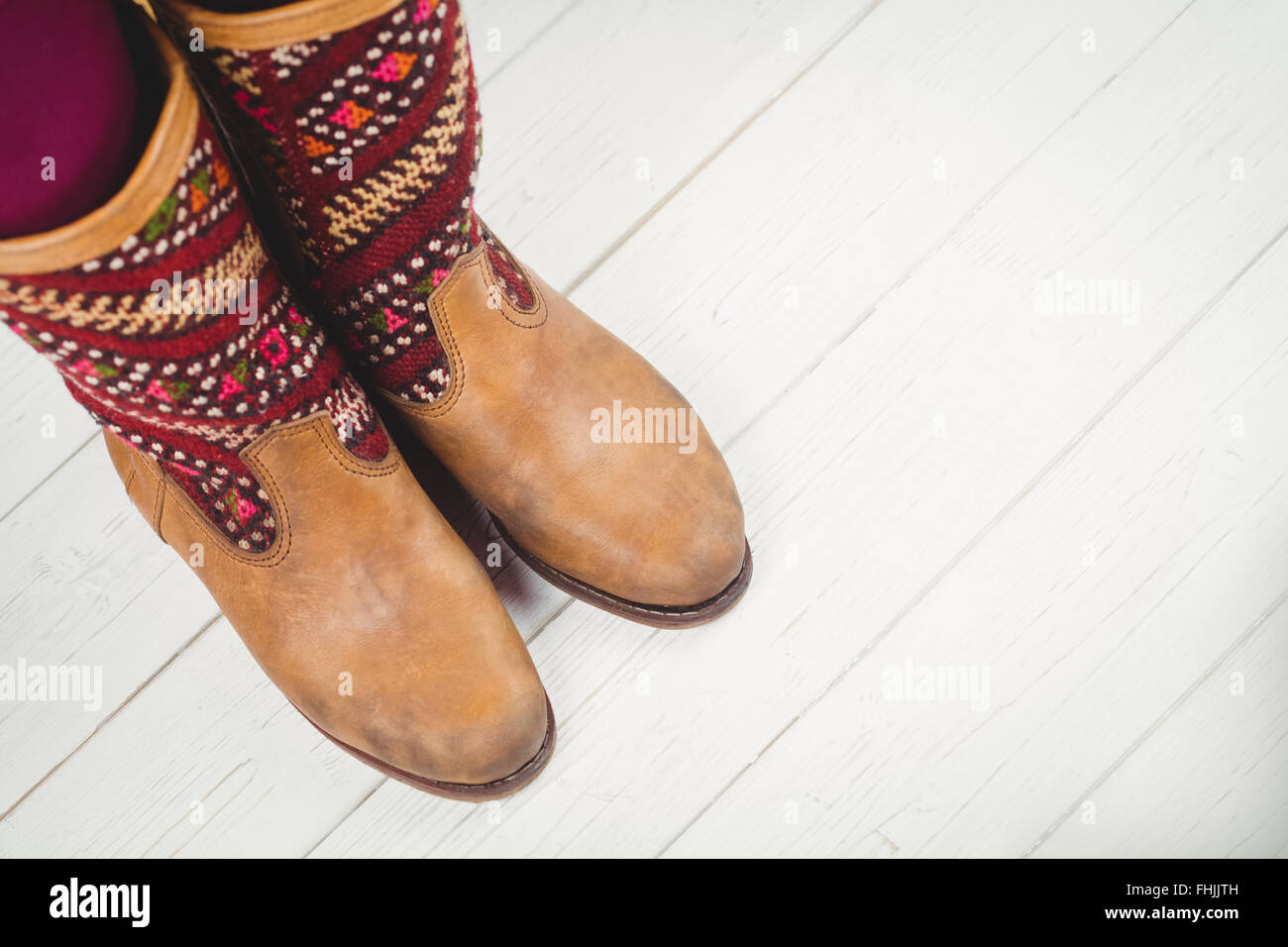 Woman wearing boots hi-res stock photography and images - Alamy