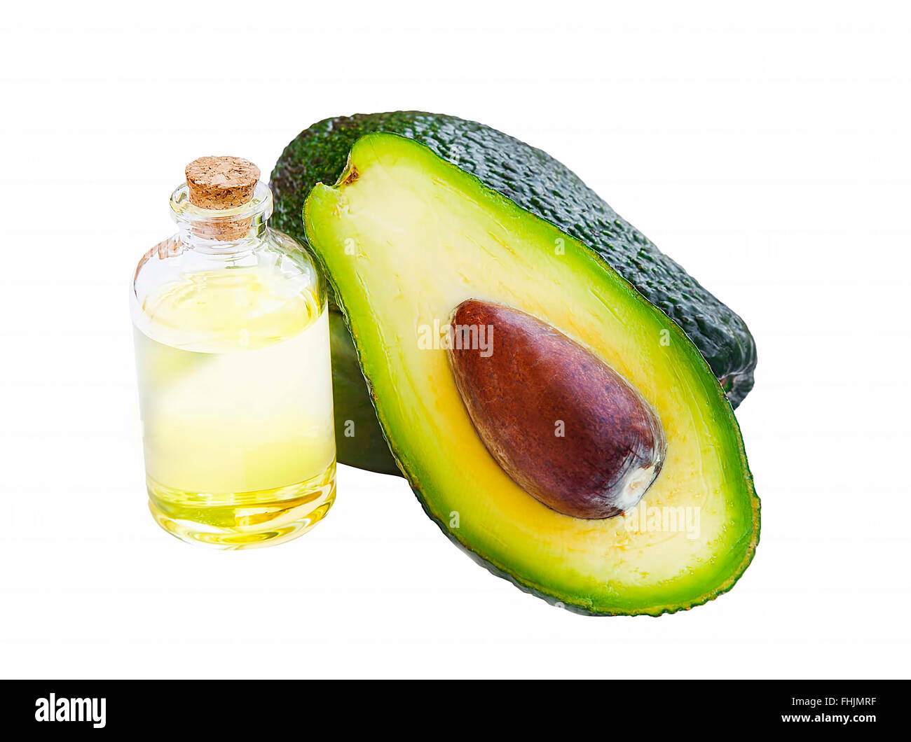 Avocado oil bottle with avocado fruit isolated on white Stock Photo - Alamy