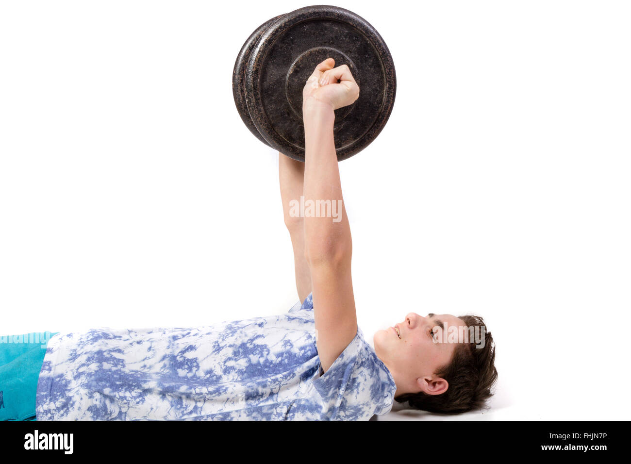 Teenage Boy lifting weights Stock Photo - Alamy