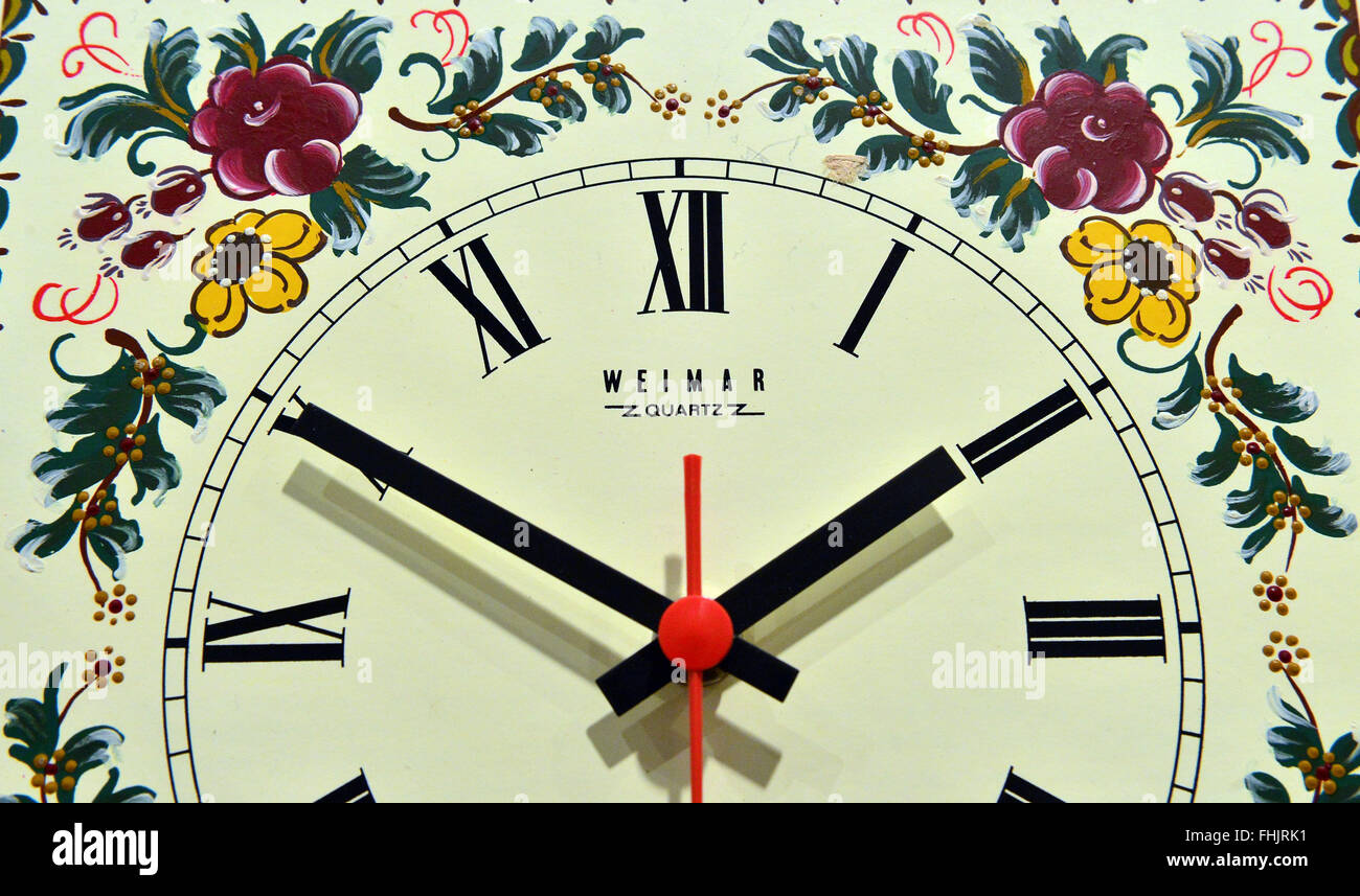 A wall clock with a folkloric design can be seen at the exhibition ...