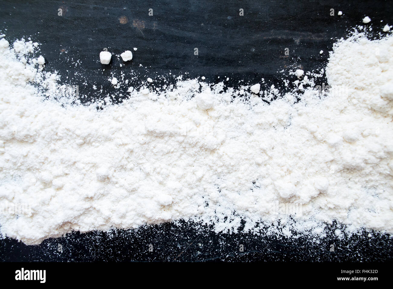Black background with flour Stock Photo - Alamy