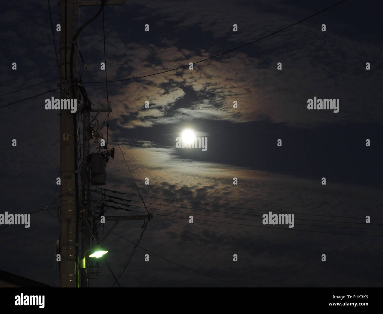 Moonlight sky with lamppost in Japan Stock Photo - Alamy