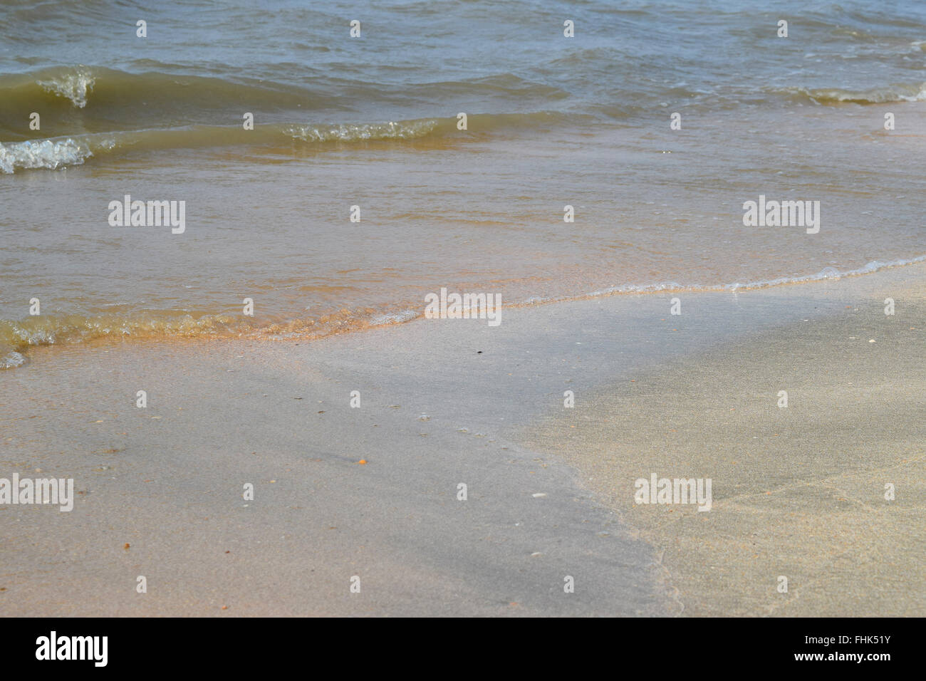 The coast of the Sea of Azov. Beach Sea summer months. Evening time ...