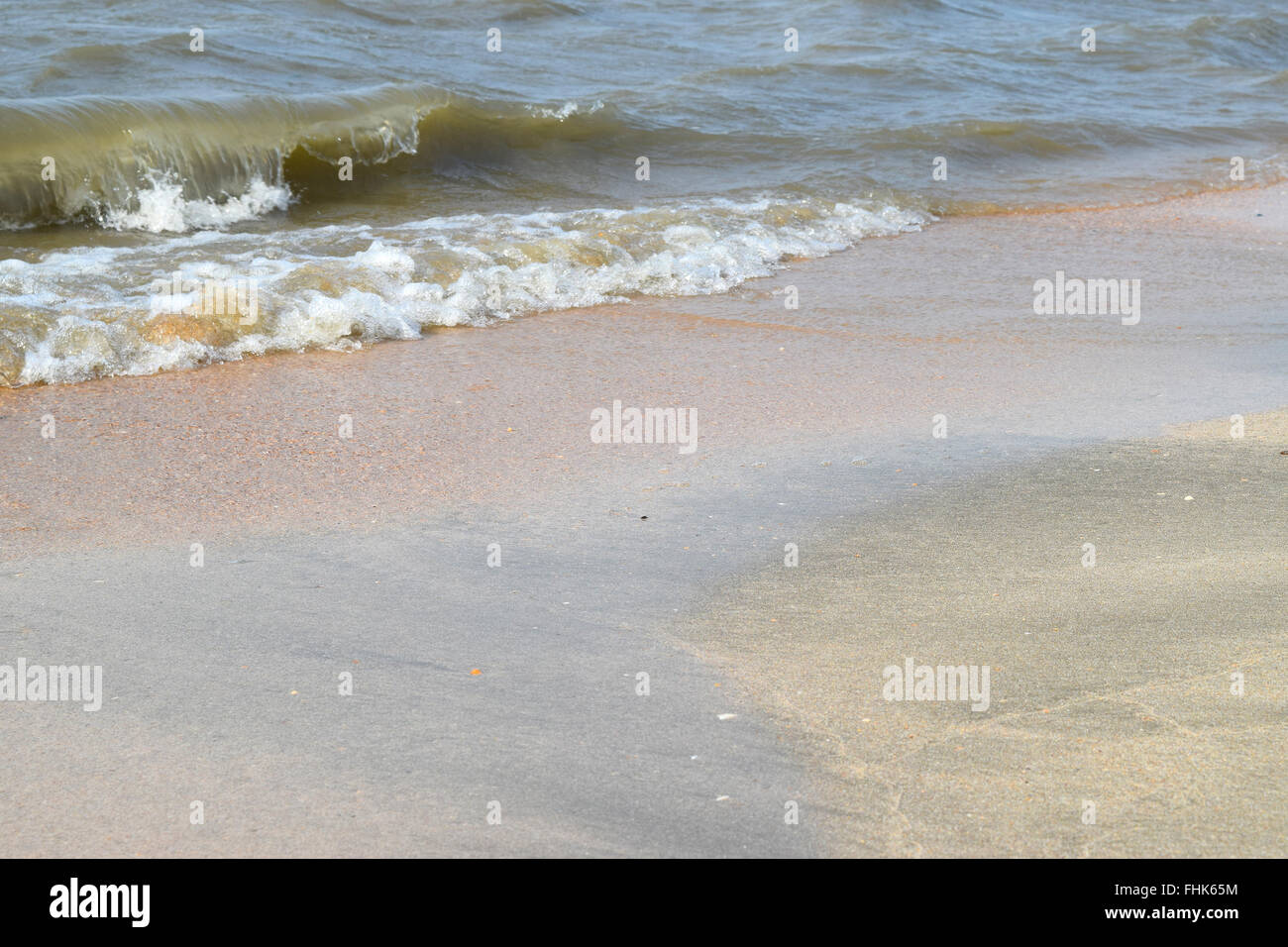 The coast of the Sea of Azov. Beach Sea summer months. Evening time ...