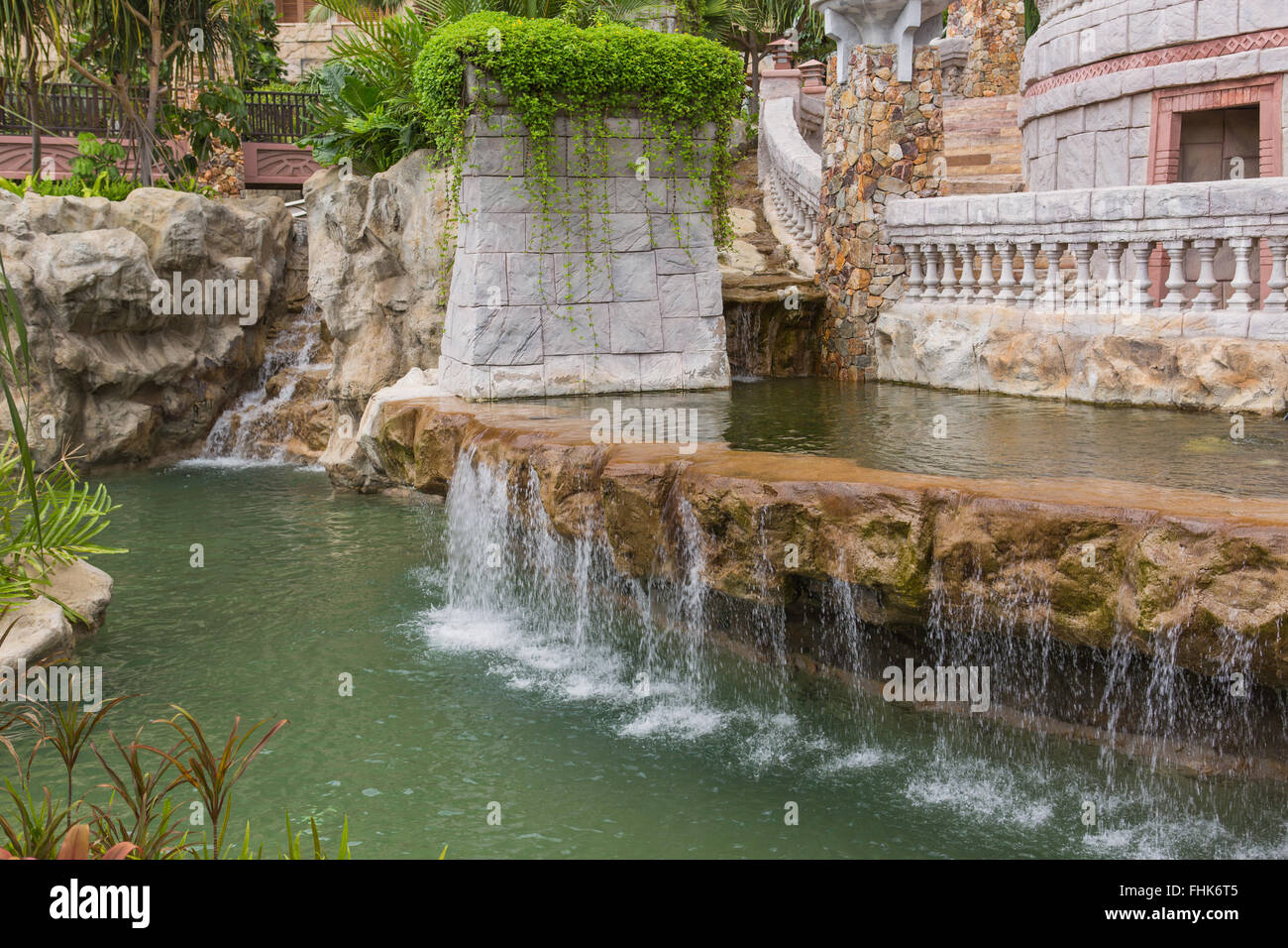 Artificial waterfall in a luxury hotel in Thailand Stock Photo - Alamy
