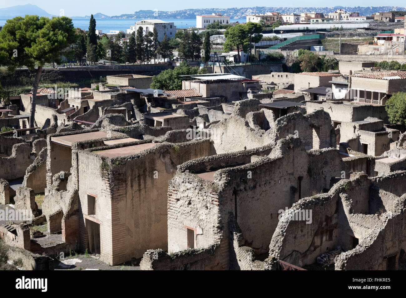 Archaeological excavation in herculaneum with modern ercolano and ...