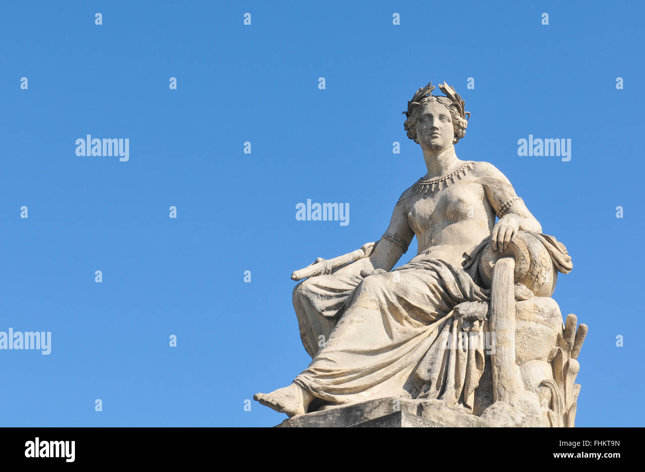 Architectural detail of statue depicting woman pouring water against ...