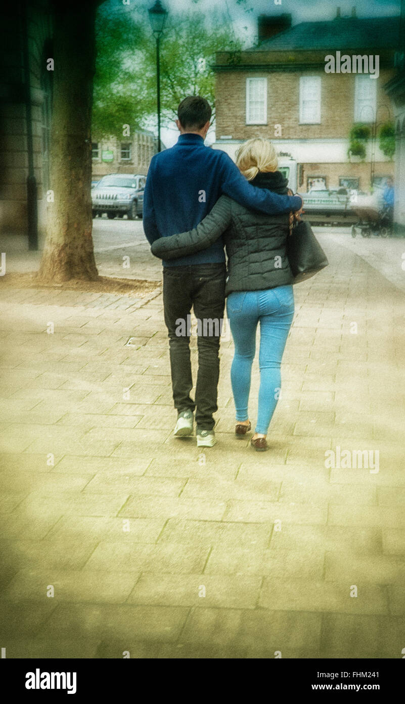 Back view couple walking arms hi-res stock photography and images - Alamy