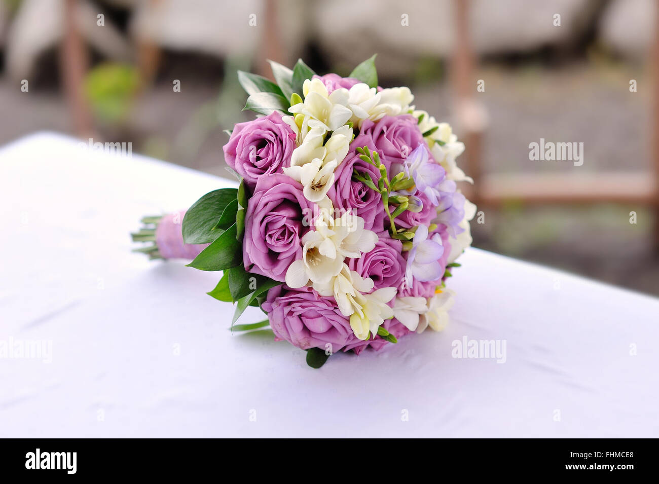 Bridal bouquet of purple roses Stock Photo - Alamy