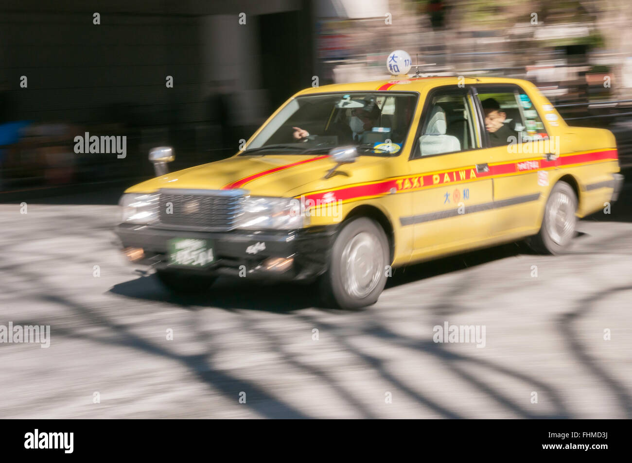 Yellow taxi shinjuku tokyo japan hi-res stock photography and images ...