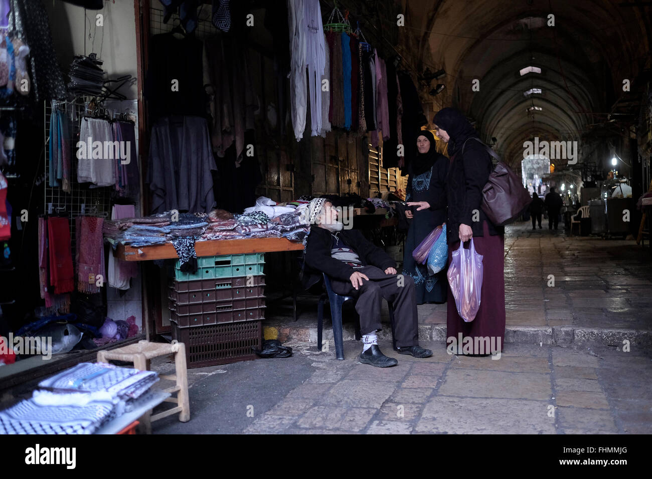 Palestinian shoppers at the entrance to the Cotton Merchants’ Gate ...