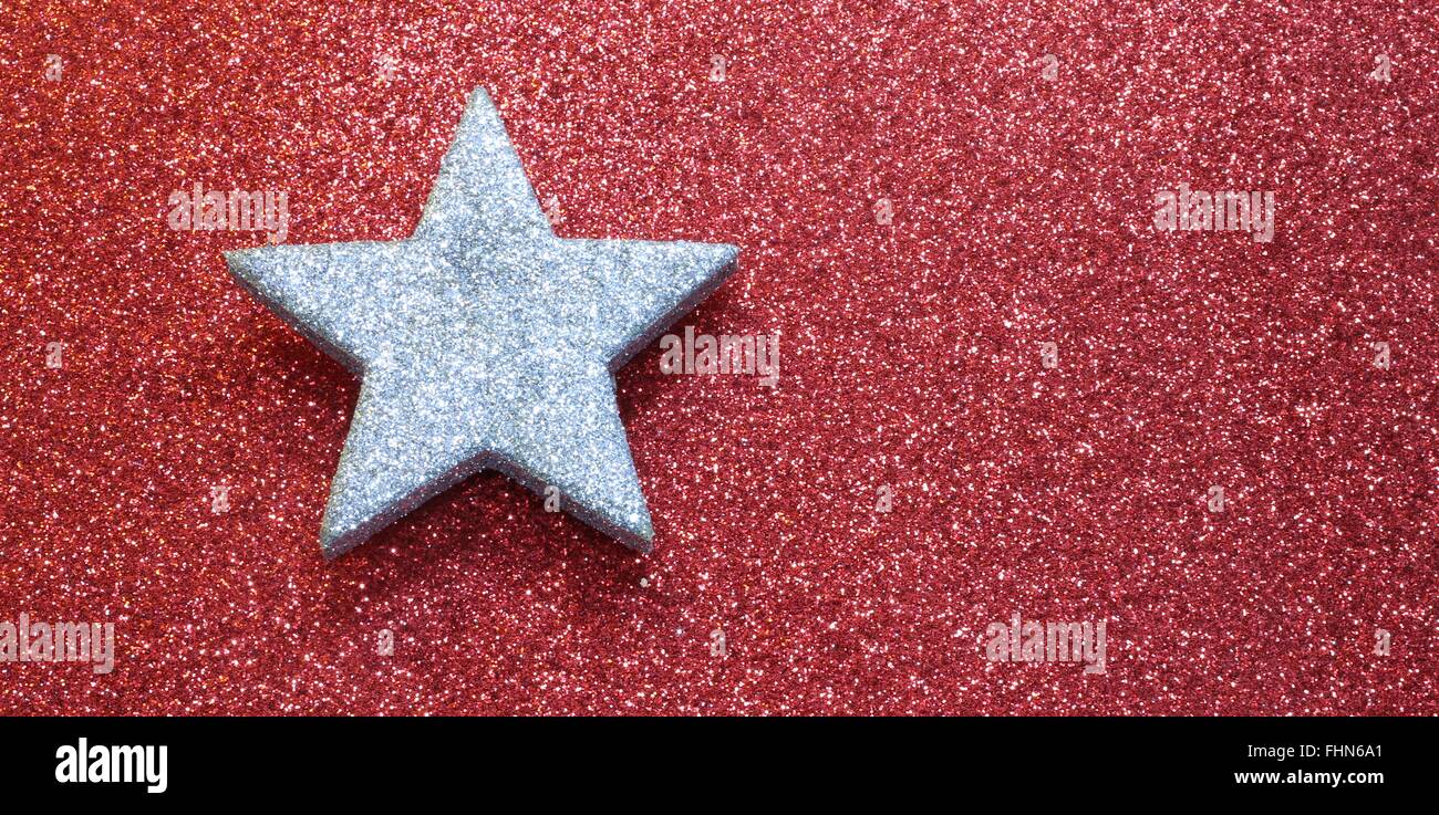 one silver star on red bright background Stock Photo - Alamy
