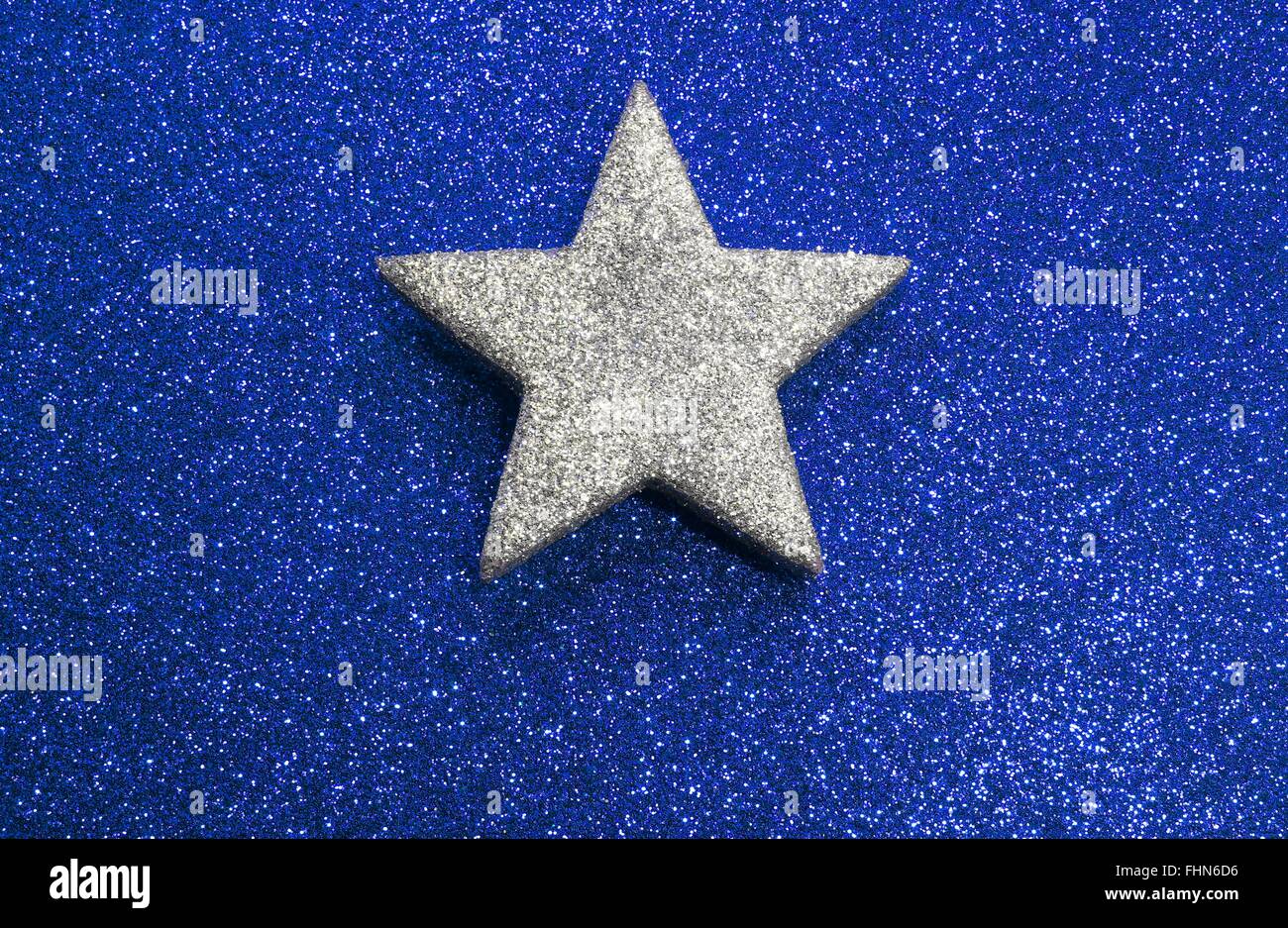 lone great silver star on golden background Stock Photo - Alamy