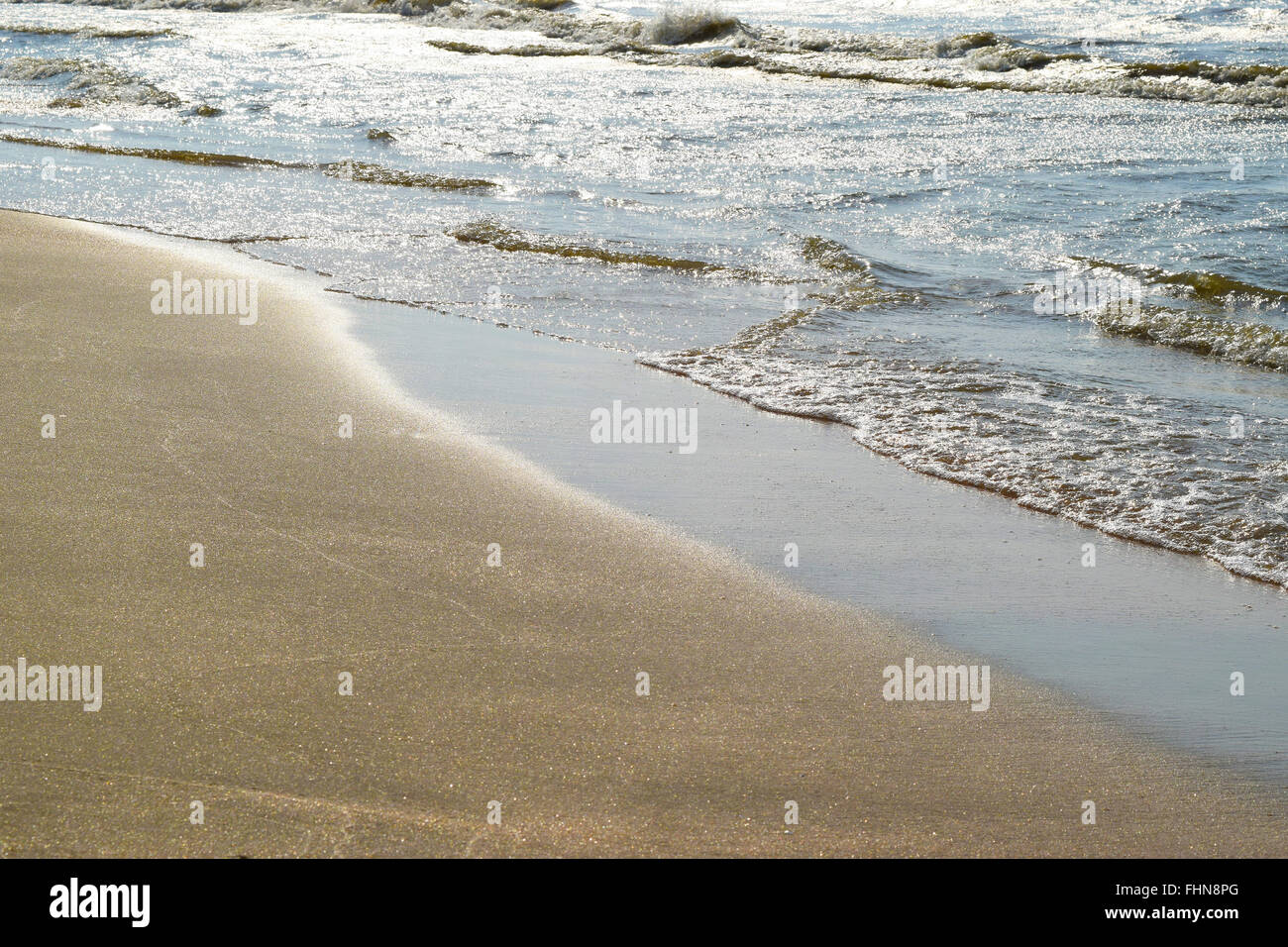 The coast of the Sea of Azov. Beach Sea summer months. Evening time ...