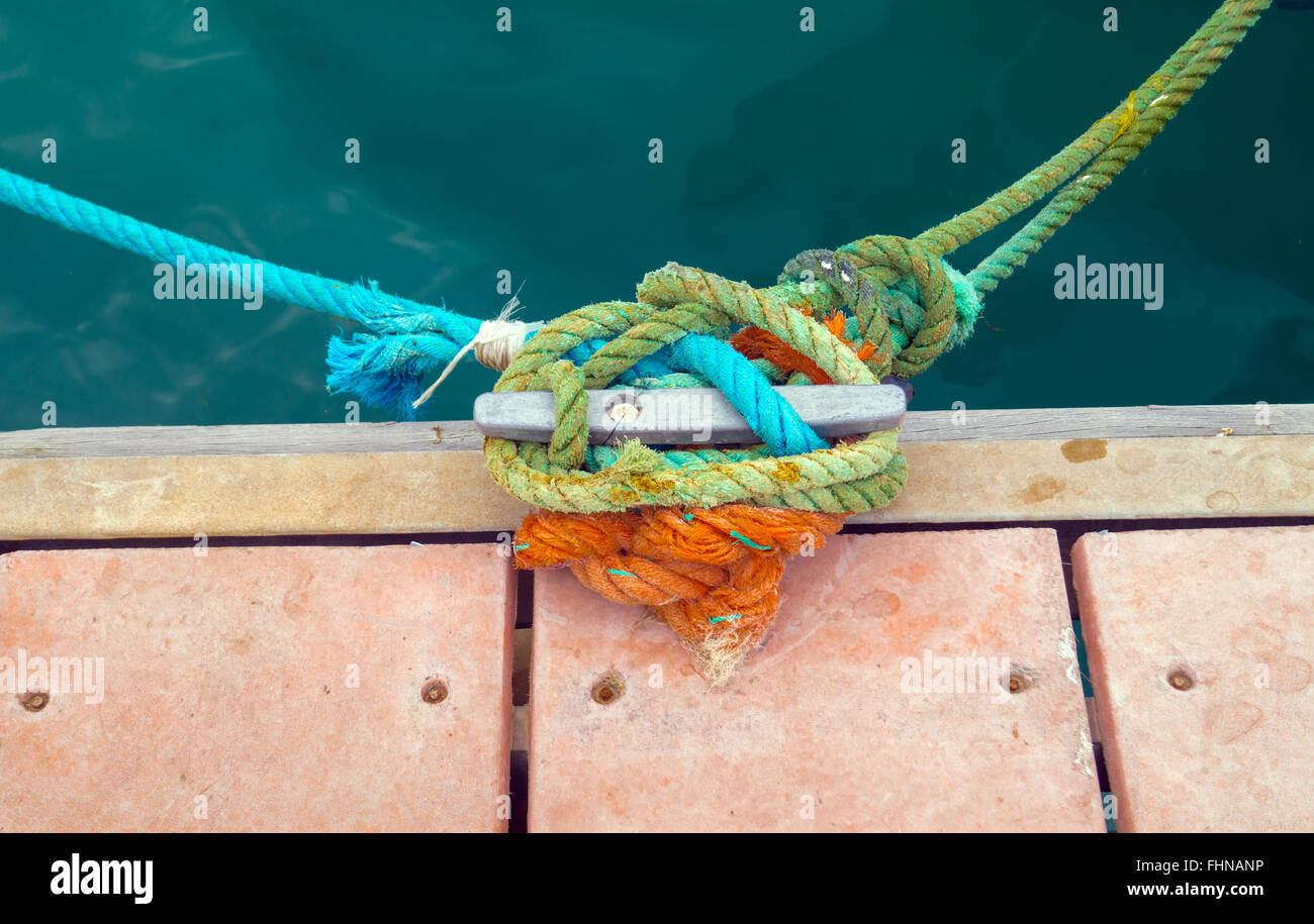 Ropes on a dock Stock Photo - Alamy