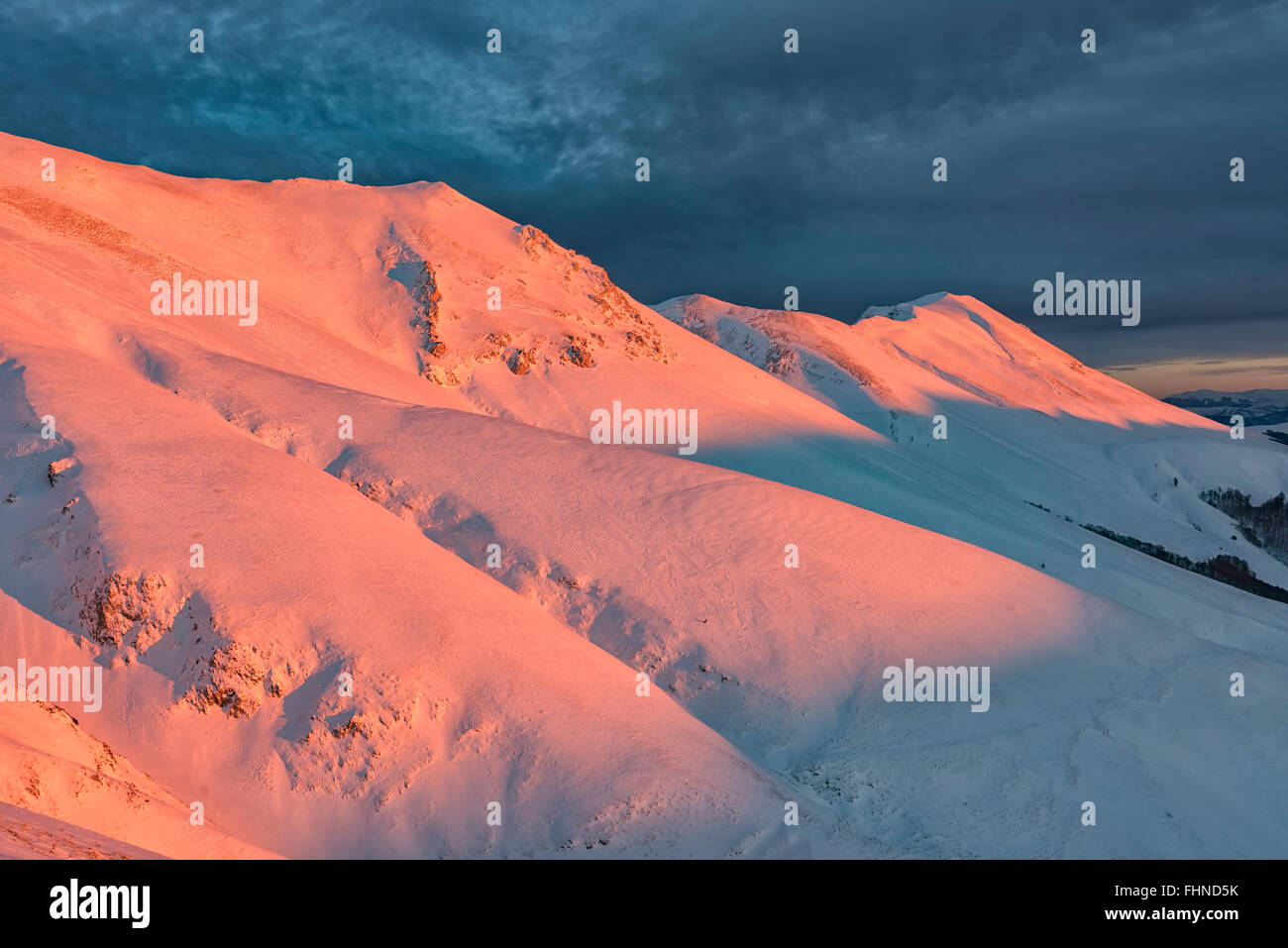 Italy, Umbria, Monti Sibillini National Park, Sunset on mountain ...