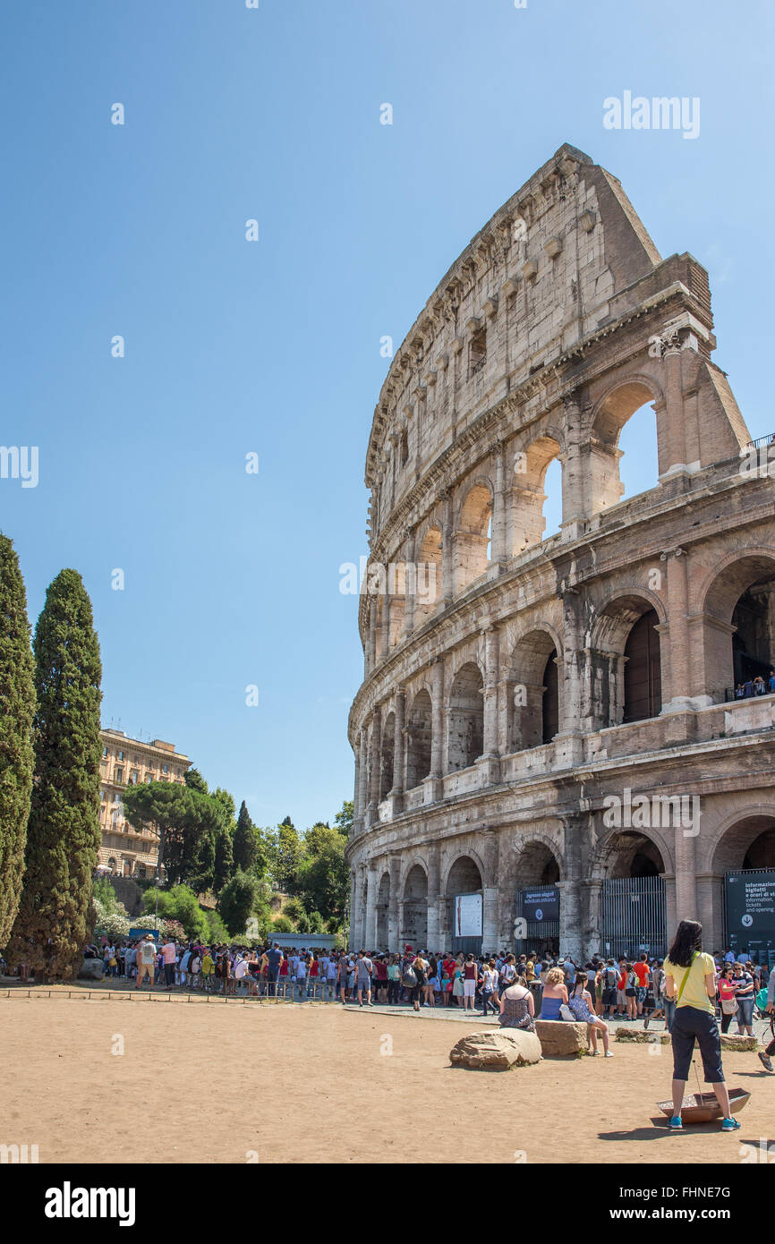 Tourists gathering at the Colosseum in Rome, Italy. The Colosseum is ...