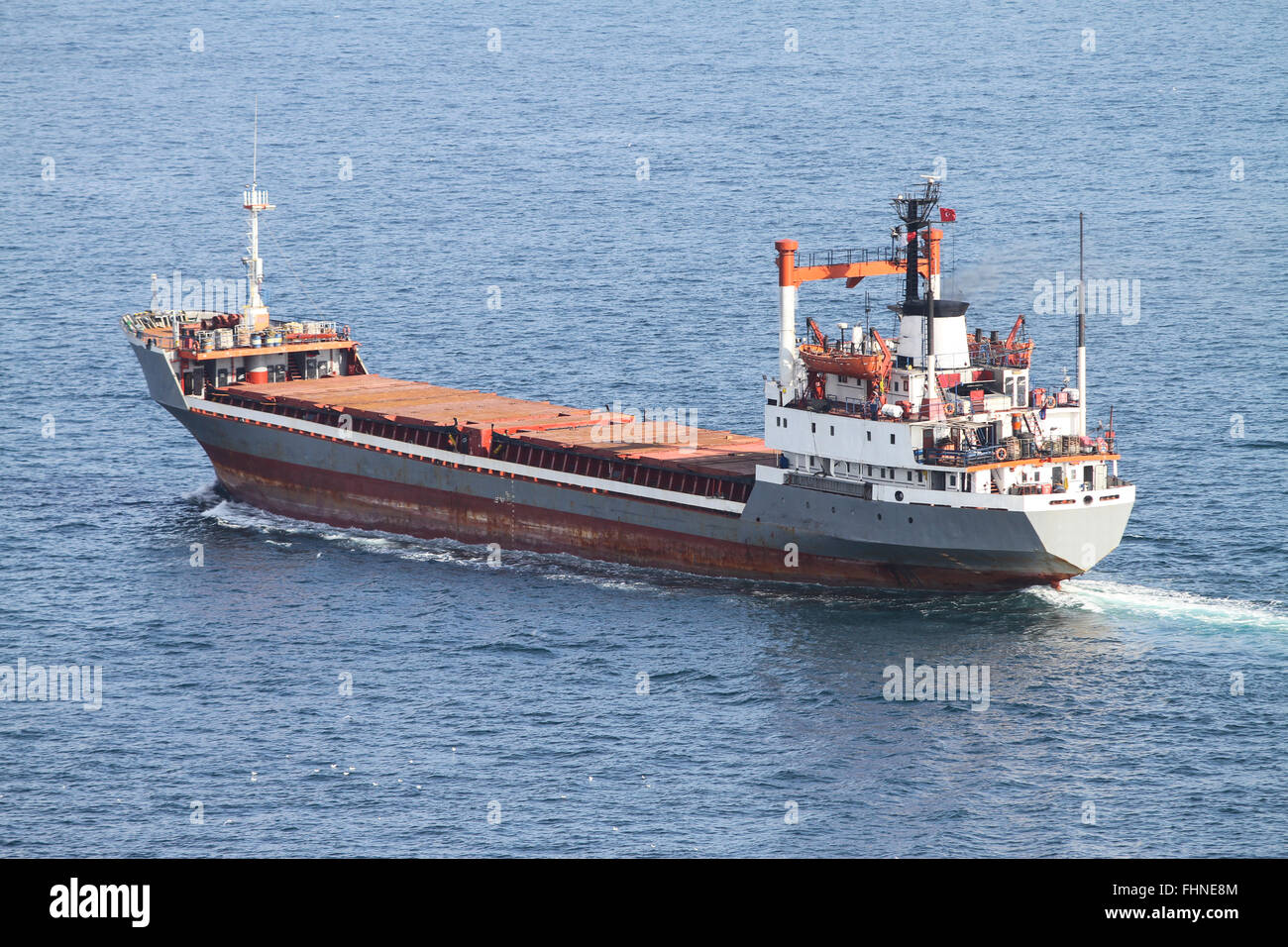 A cargo ship carrying goods between ports Stock Photo - Alamy