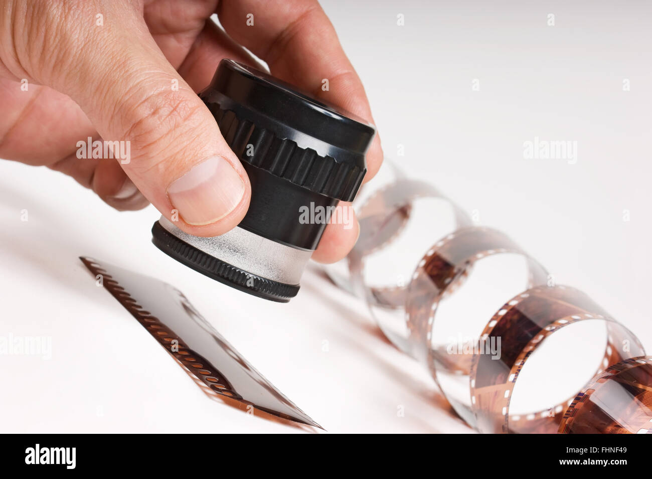 Hand holding magnifier hi-res stock photography and images - Alamy