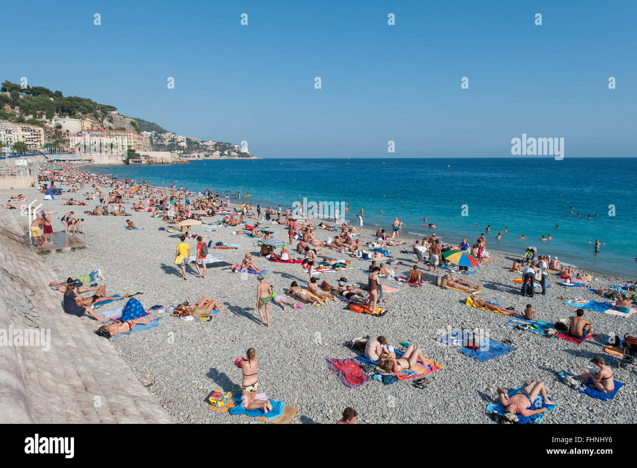 The busy beach at Nice in Summer Stock Photo - Alamy
